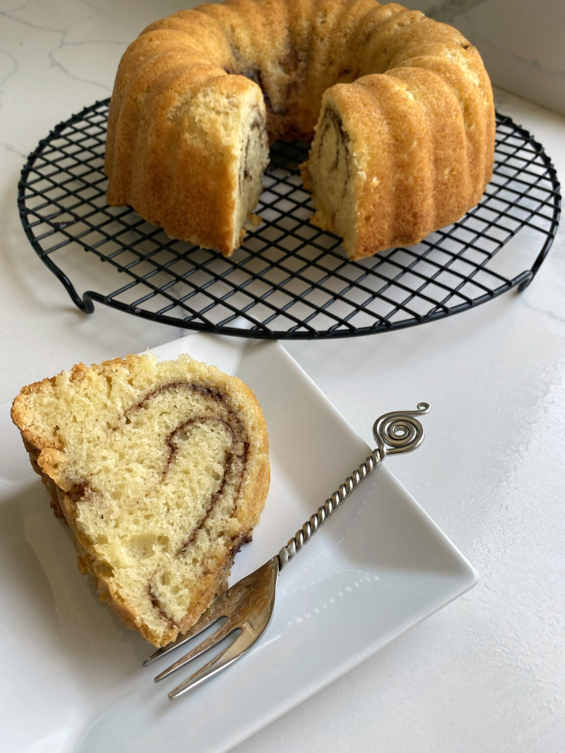 Sour Cream Cinnamon Swirl Bundt Cake - A Feast For The Eyes